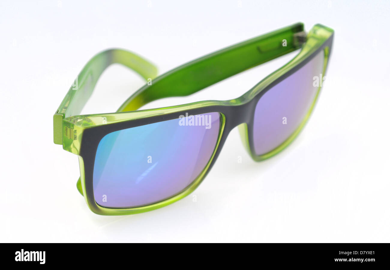 Stylish green and black sunglasses on white background Stock Photo - Alamy