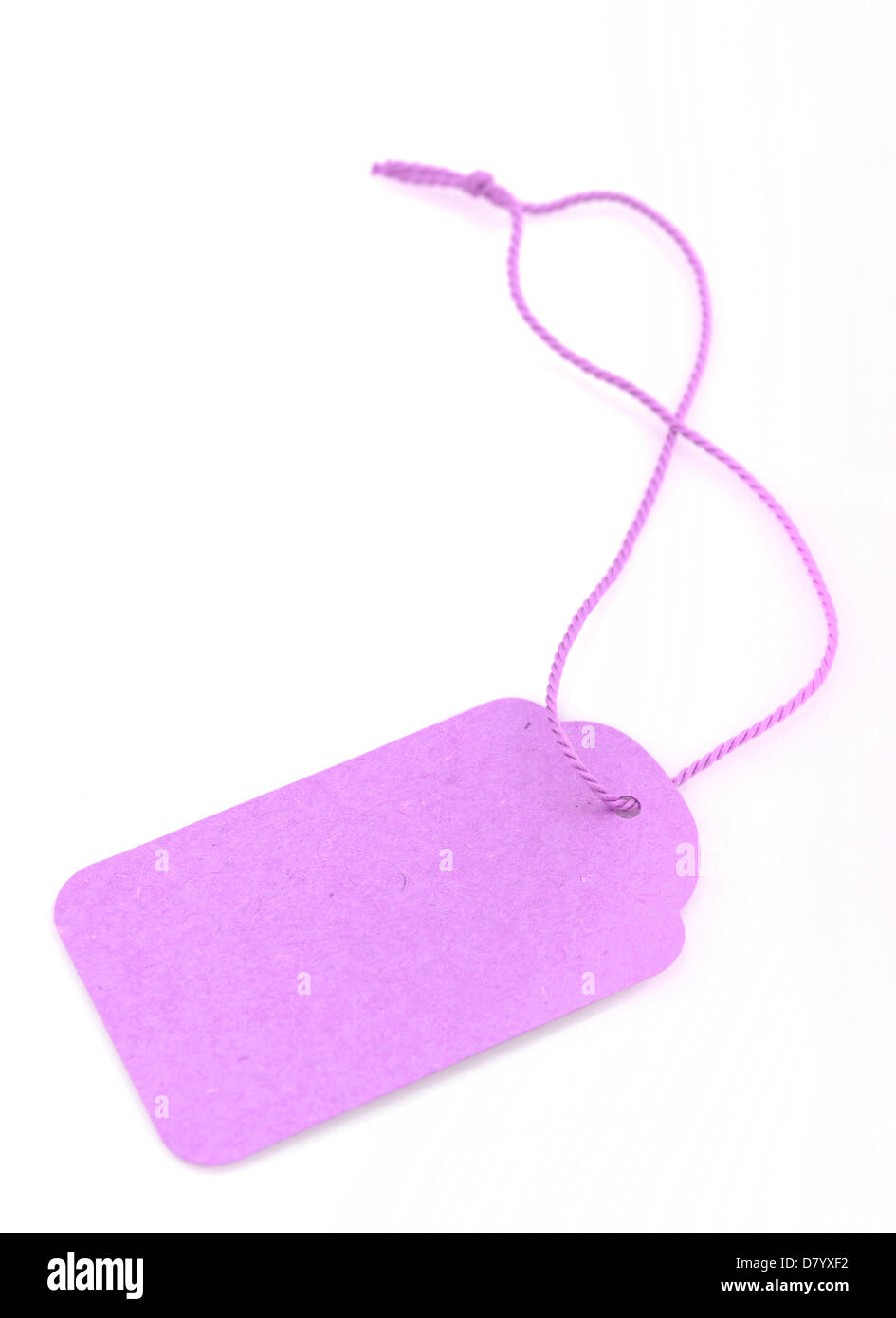 Blank purple gift tag tied with string to write own message Stock Photo ...