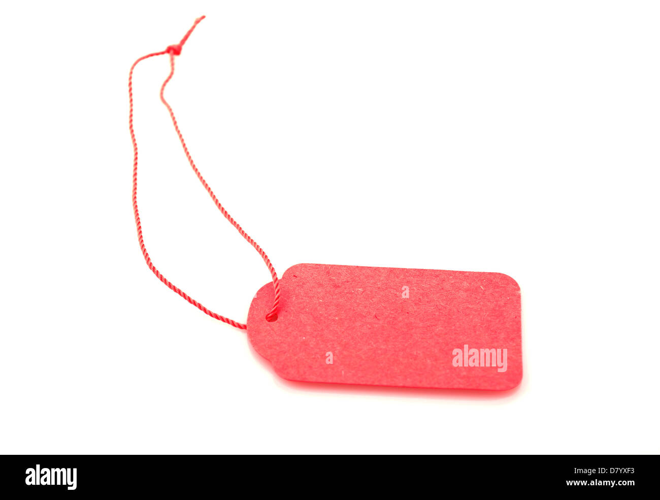 Blank red holiday gift tag tied with string Stock Photo - Alamy