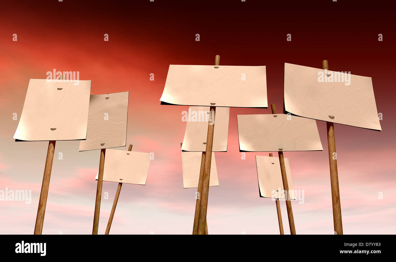 A set of nine blank, white picket placards attached to wooden stakes on ...