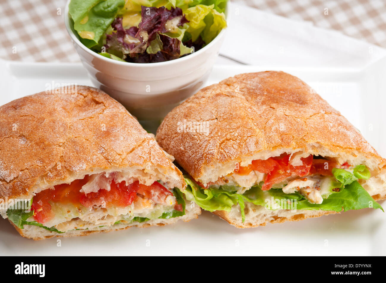 italian ciabatta panini sandwich with chicken and tomato Stock Photo ...