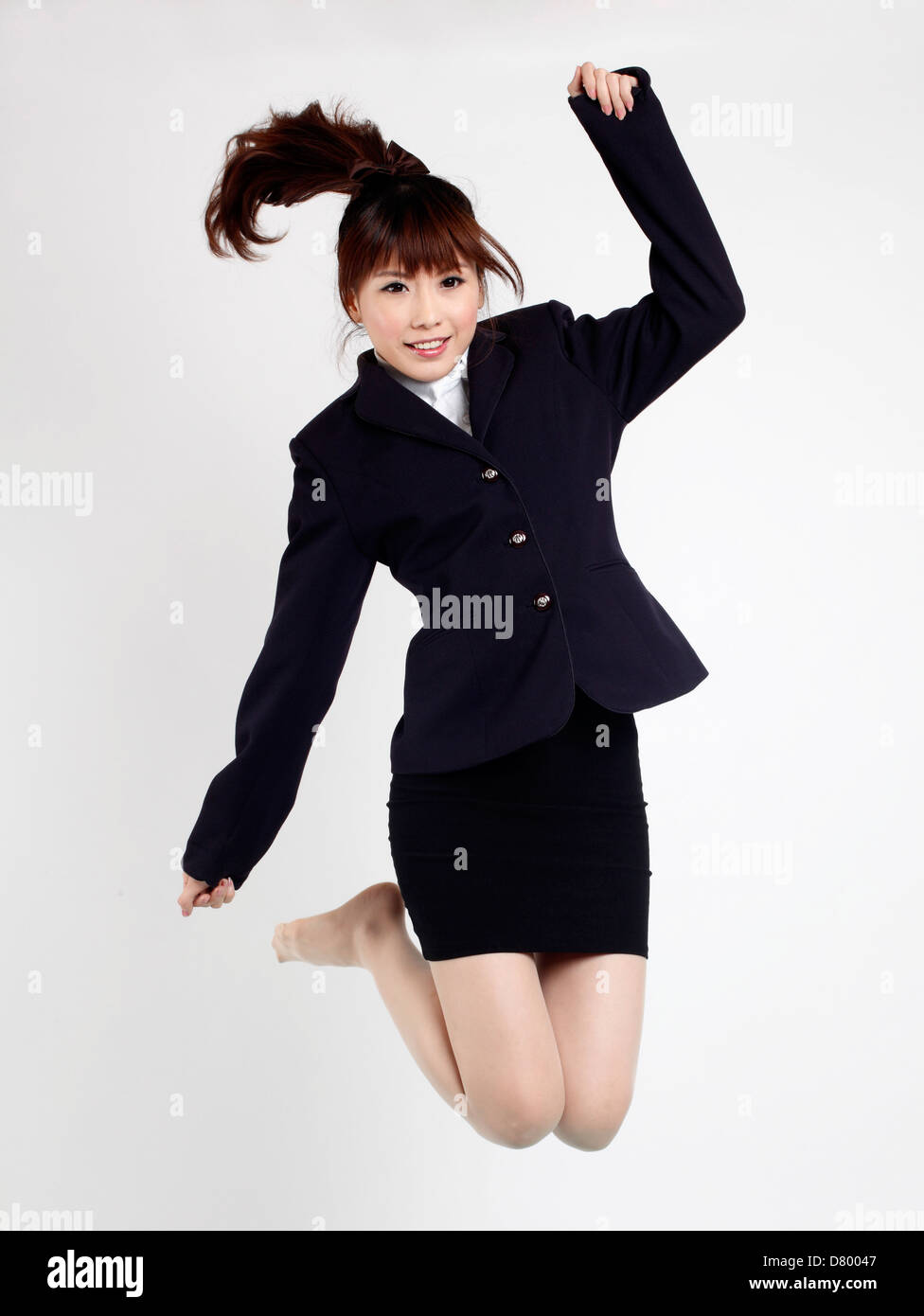 Office lady plays jumping Stock Photo - Alamy