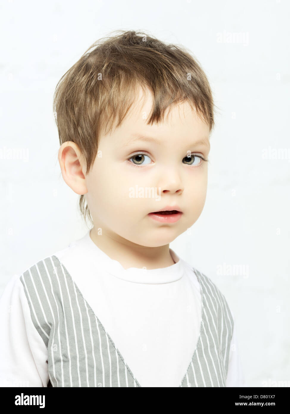 beautiful serious boy portrait, on white background Stock Photo - Alamy