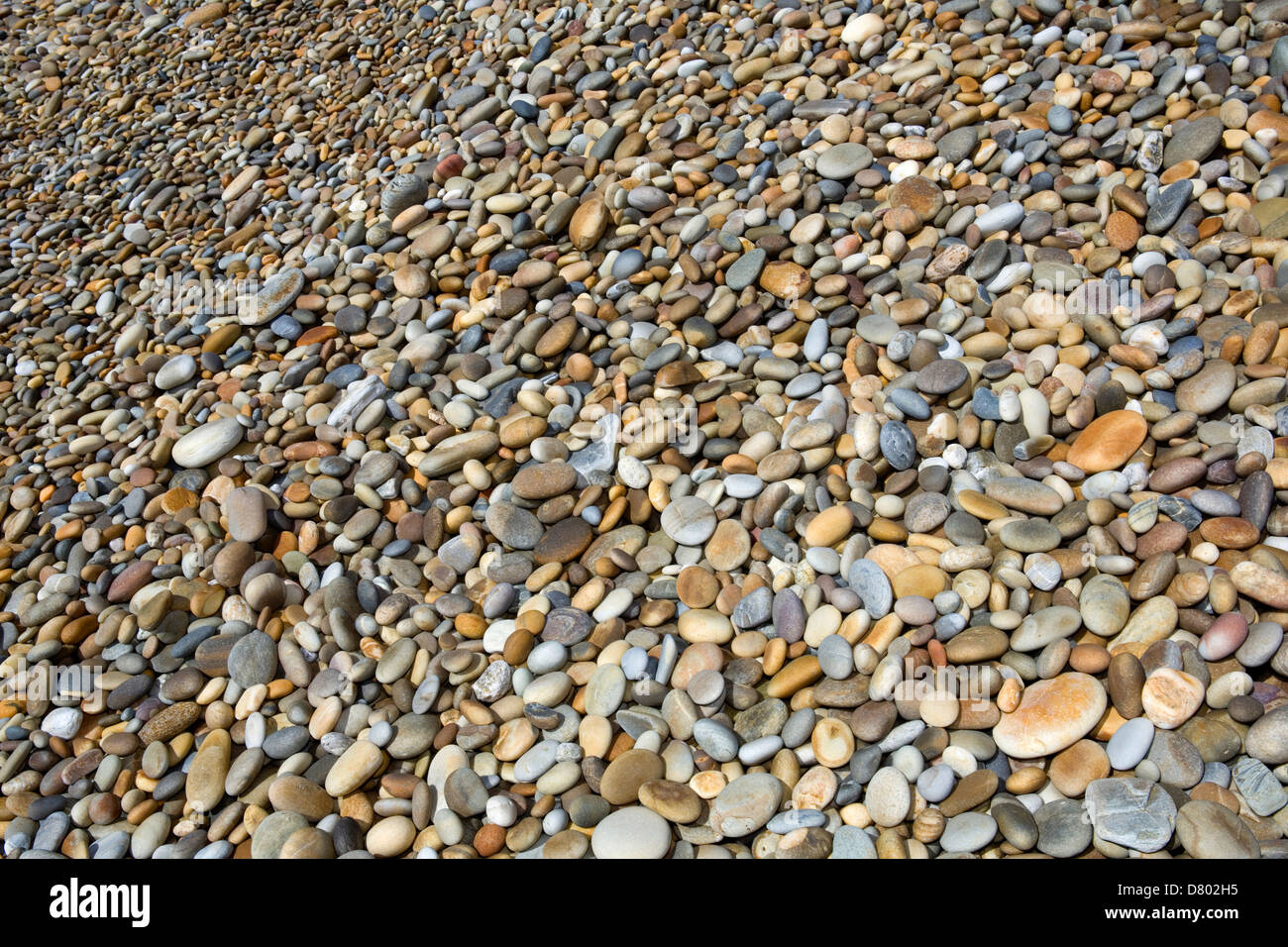 colorful pebble stone background, at the beach Stock Photo - Alamy