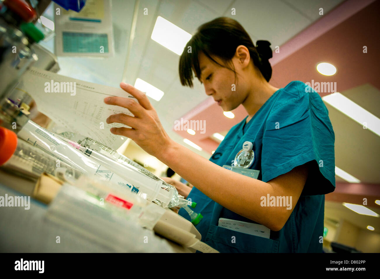 A nurse orders equipment needed on the intensive care unit Stock Photo ...