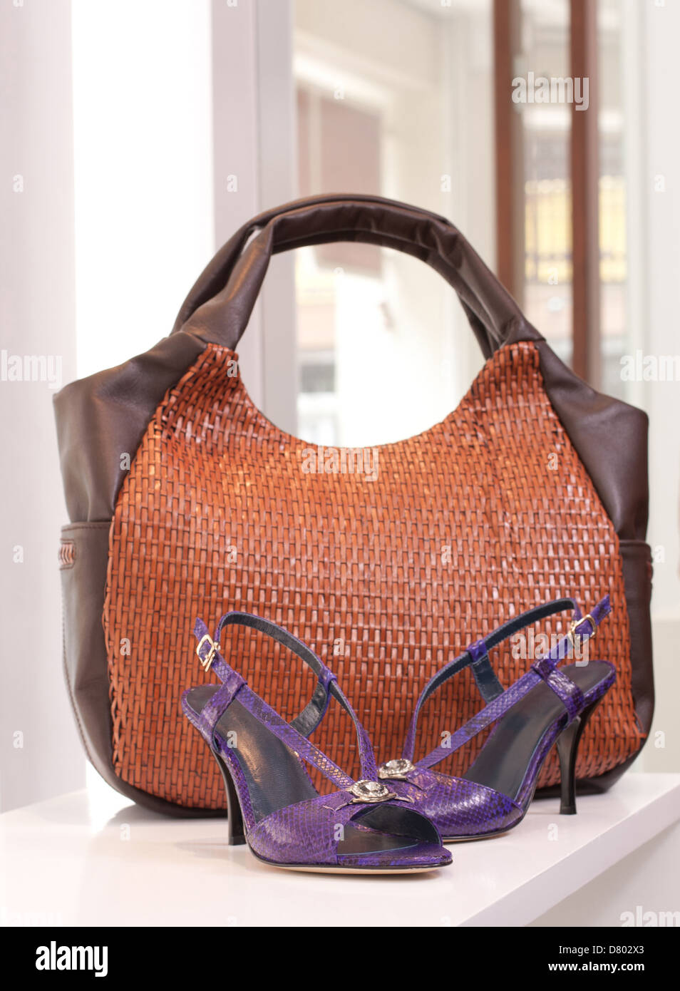 Beautiful high heel shoe and luxury handbag Stock Photo - Alamy