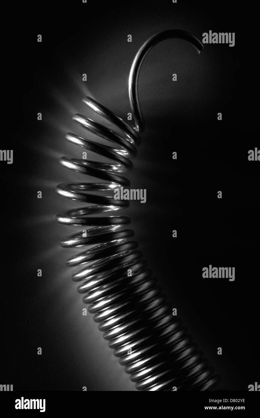 Close up of coiled metal spring Stock Photo - Alamy