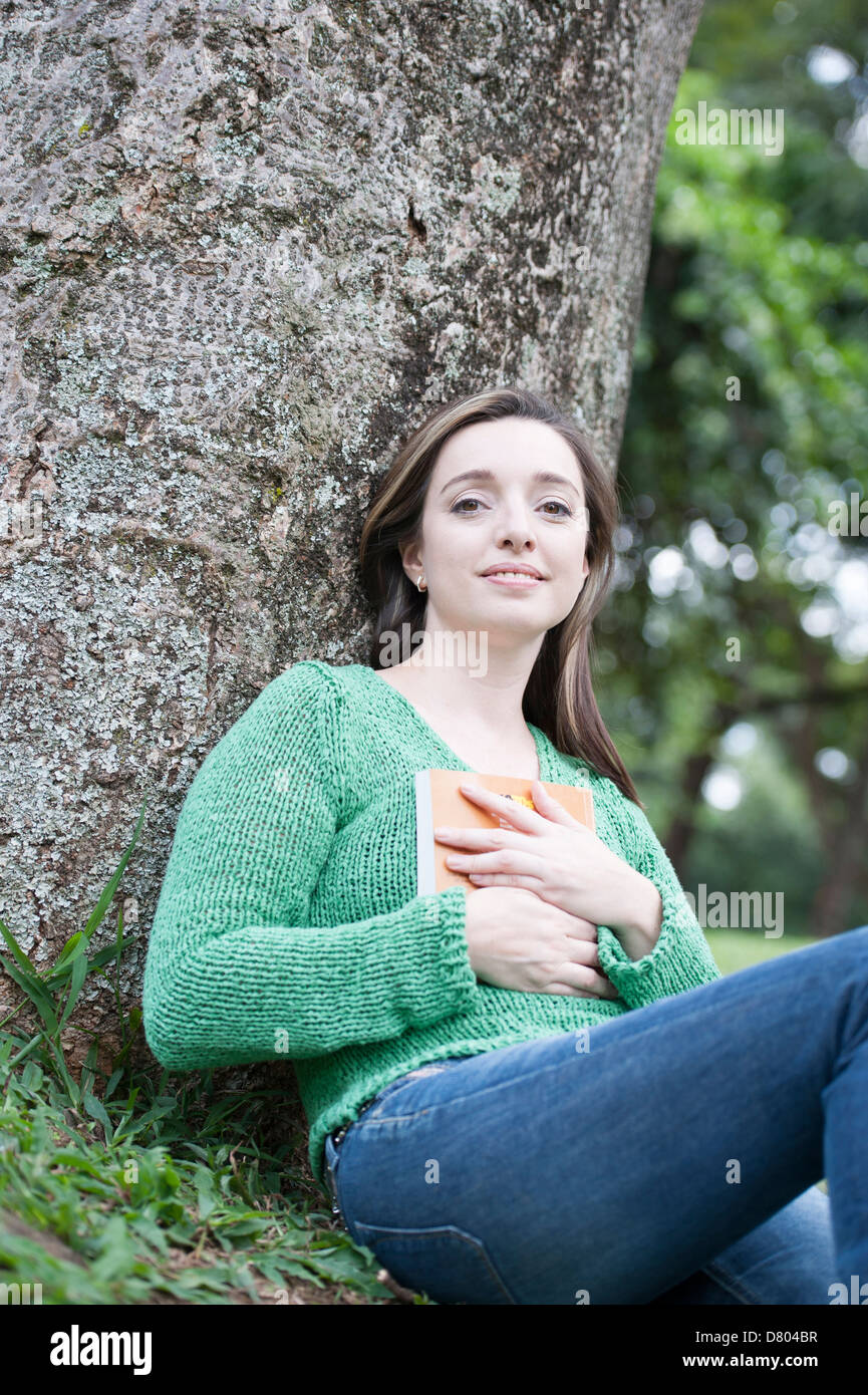 Woman reading outdoors hi-res stock photography and images - Alamy