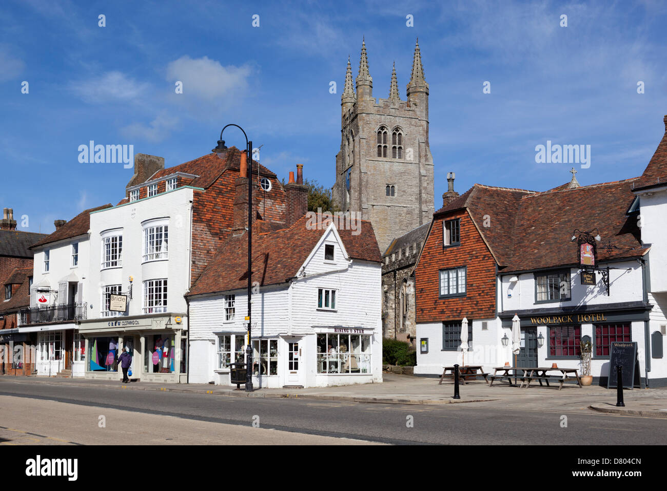 View of church and High Street with Woolpack Hotel Stock Photo - Alamy