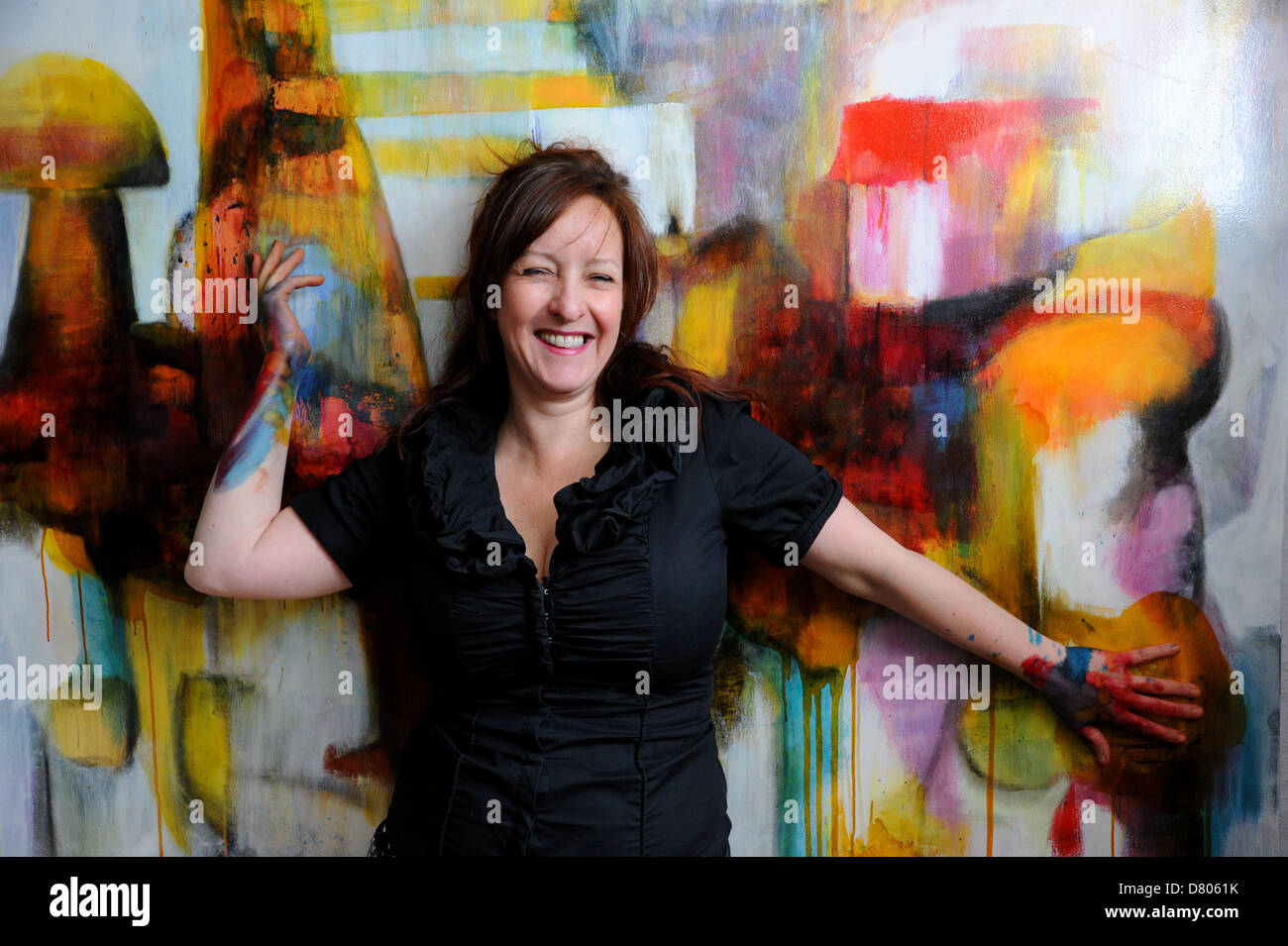 Artist Caia Matheson with one of her paintings which will be on display ...