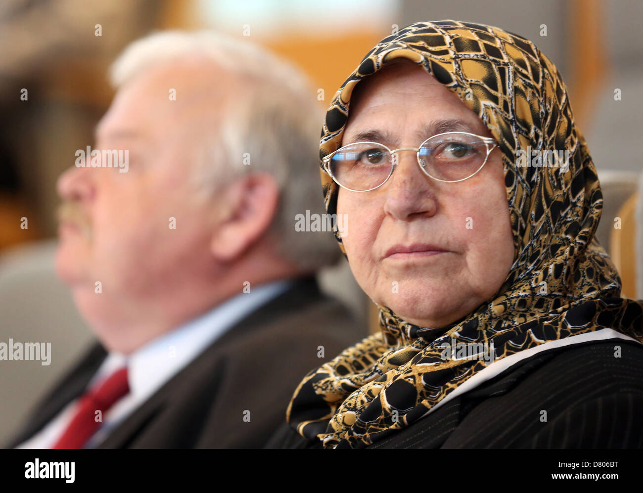 Mevlude Genc sits next to North Rhine-Westphalian Minister for ...