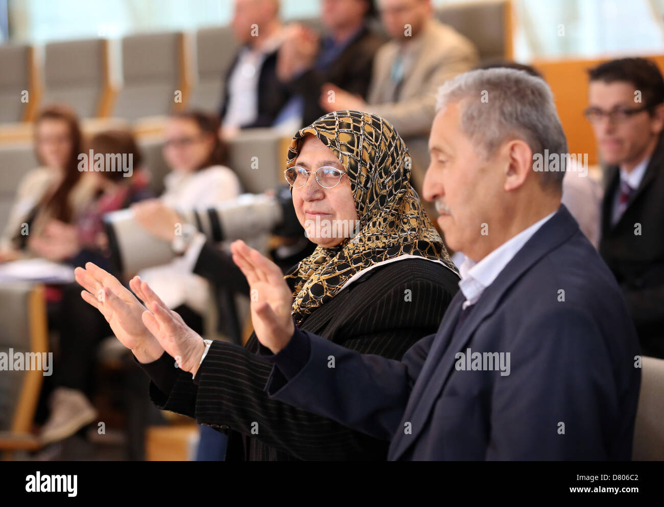 Mevlude Genc and her husband Durmus attend a commemorative meeting at ...