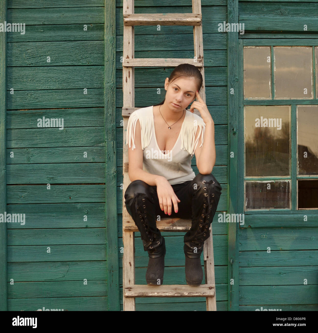 Young ladder hi-res stock photography and images - Alamy