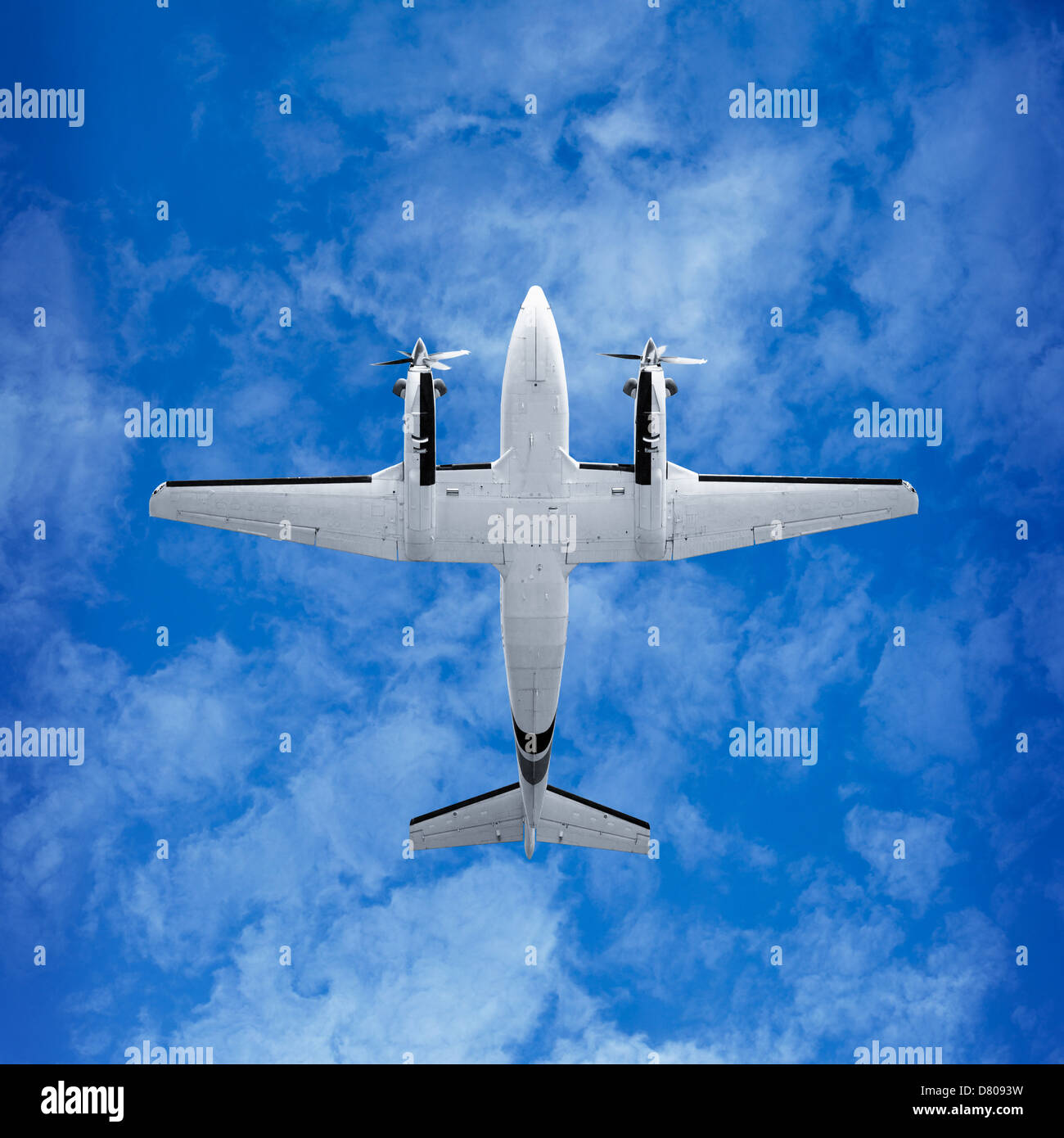 Bottom view - twin prop cargo plane on sky background Stock Photo - Alamy