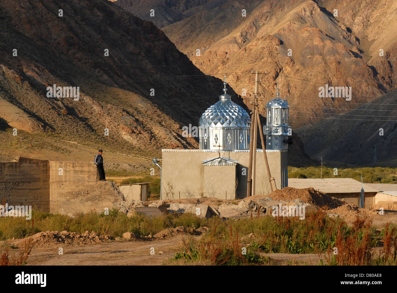 A man near the newly built mosque in the Kyrgyz village in the ...