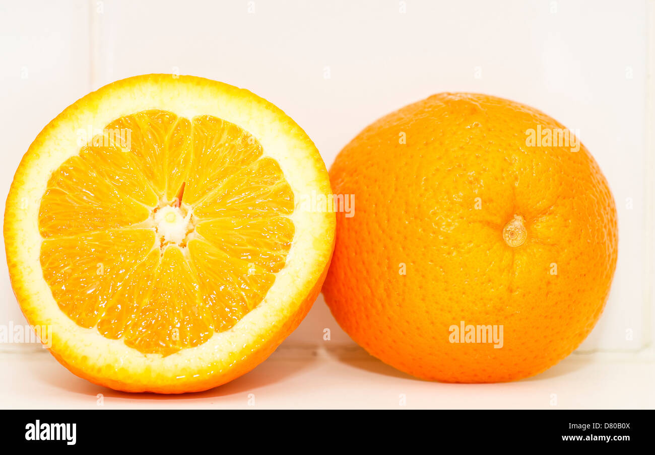 Half orange on light hi-res stock photography and images - Alamy