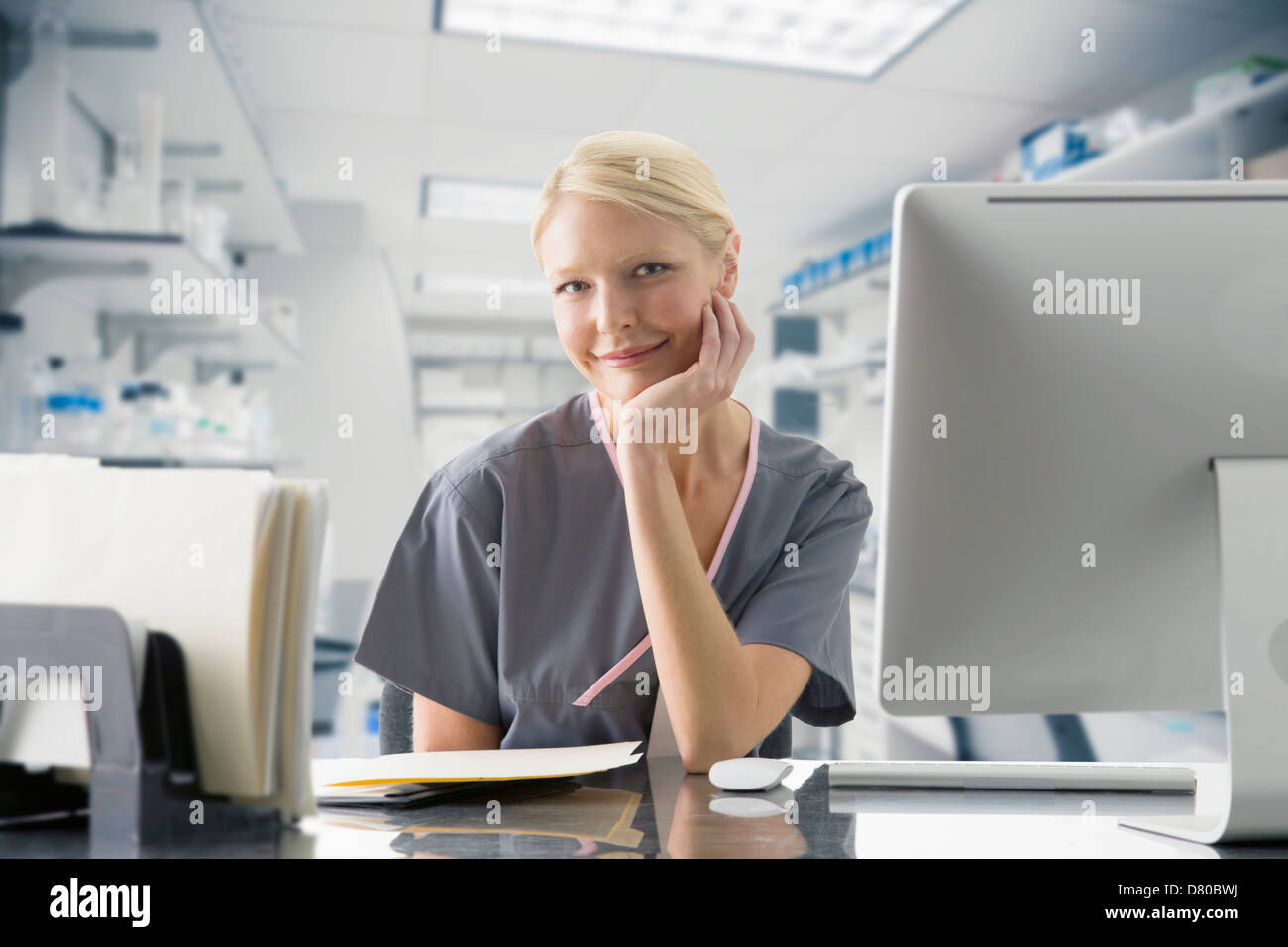 Caucasian nurse working at computer in hospital Stock Photo - Alamy