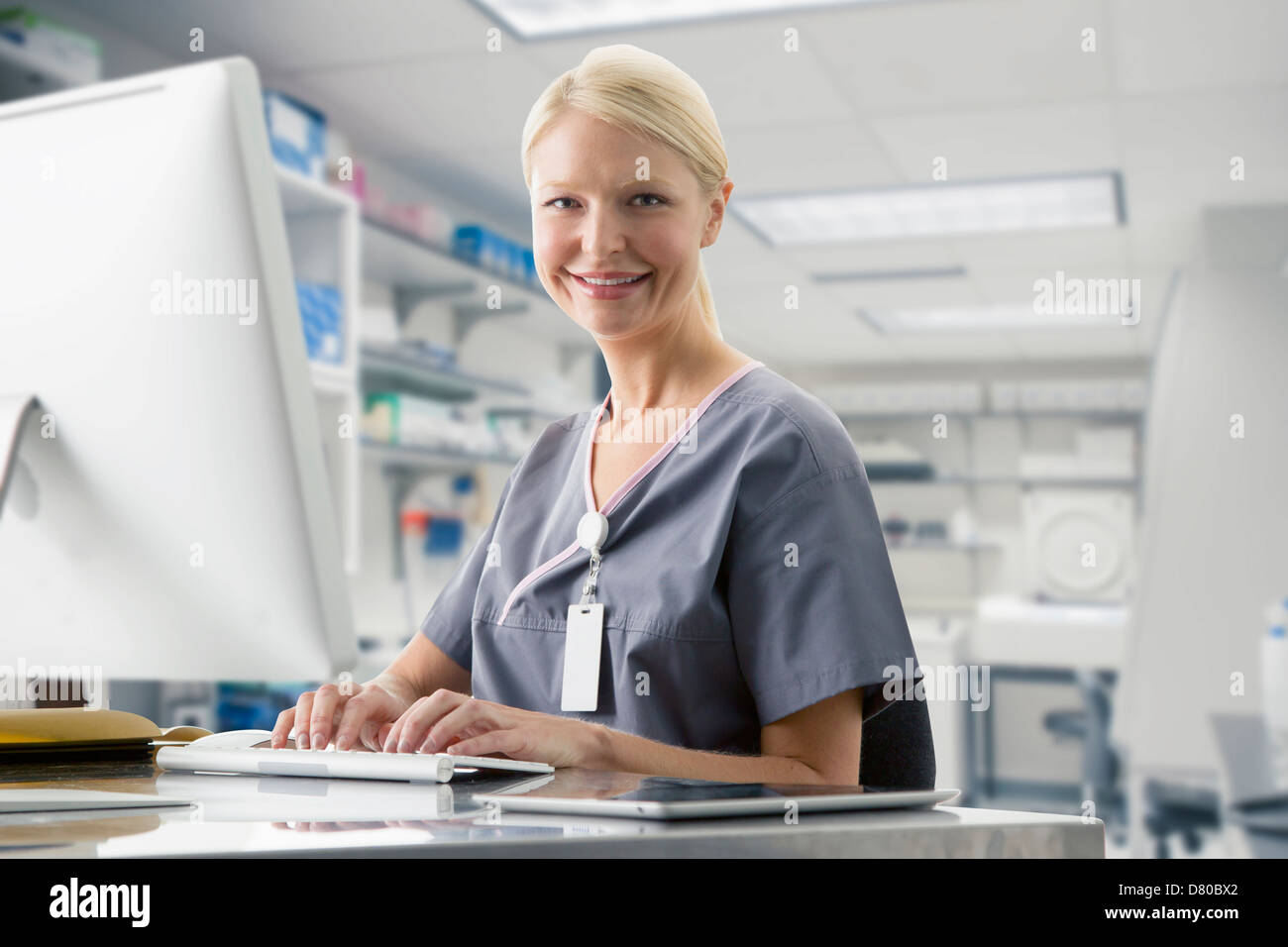 Caucasian nurse working at computer in hospital Stock Photo - Alamy