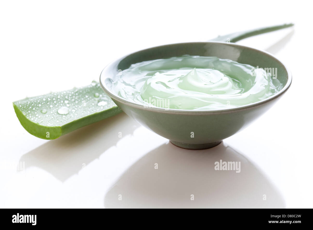 Aloe vera gel and fresh aloe leaf Stock Photo - Alamy