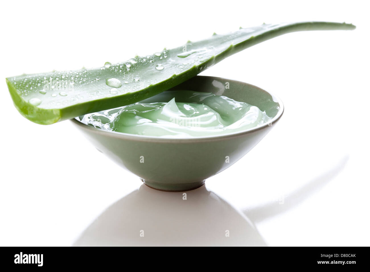 Aloe vera gel and fresh aloe leaf Stock Photo - Alamy