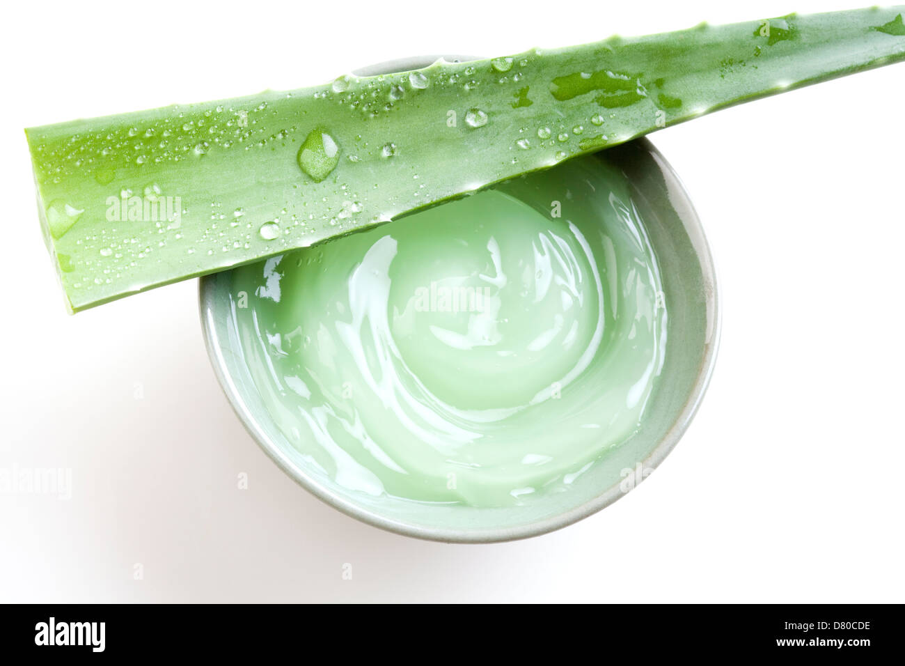 Aloe vera gel and fresh aloe leaf Stock Photo - Alamy