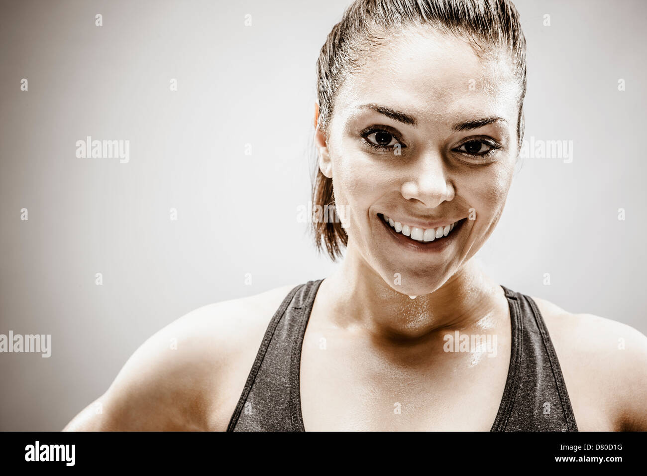Smiling Caucasian woman sweating during workout Stock Photo - Alamy