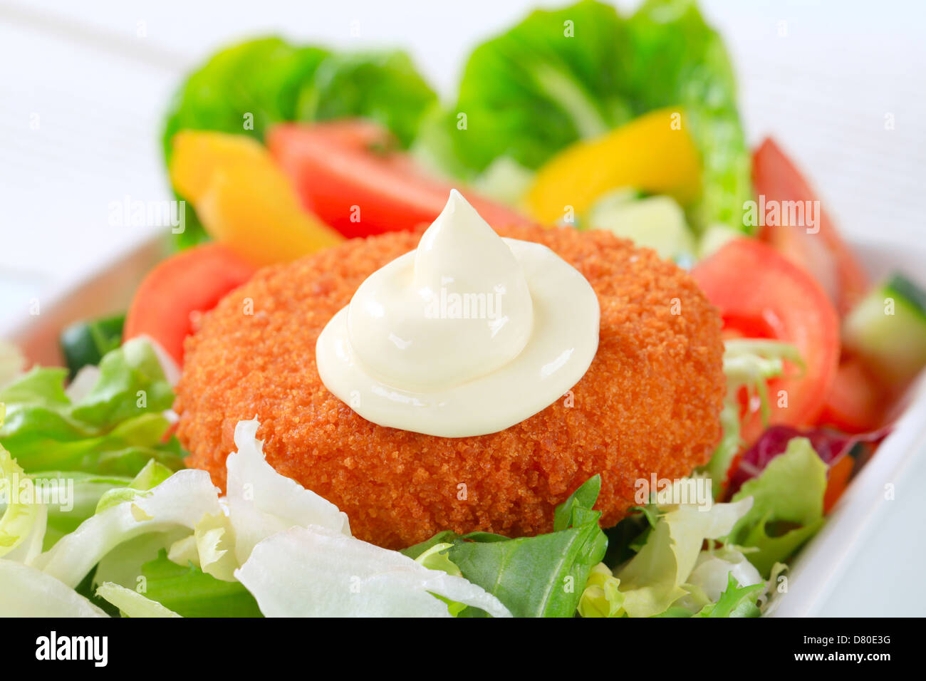 Fried breaded cheese with mayonnaise Stock Photo - Alamy