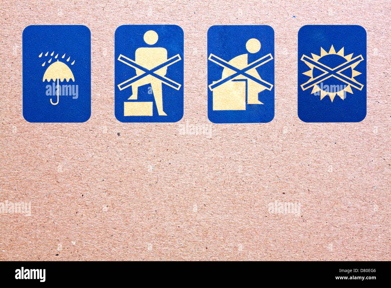 Symbol beside the box packing on cardboard Stock Photo - Alamy