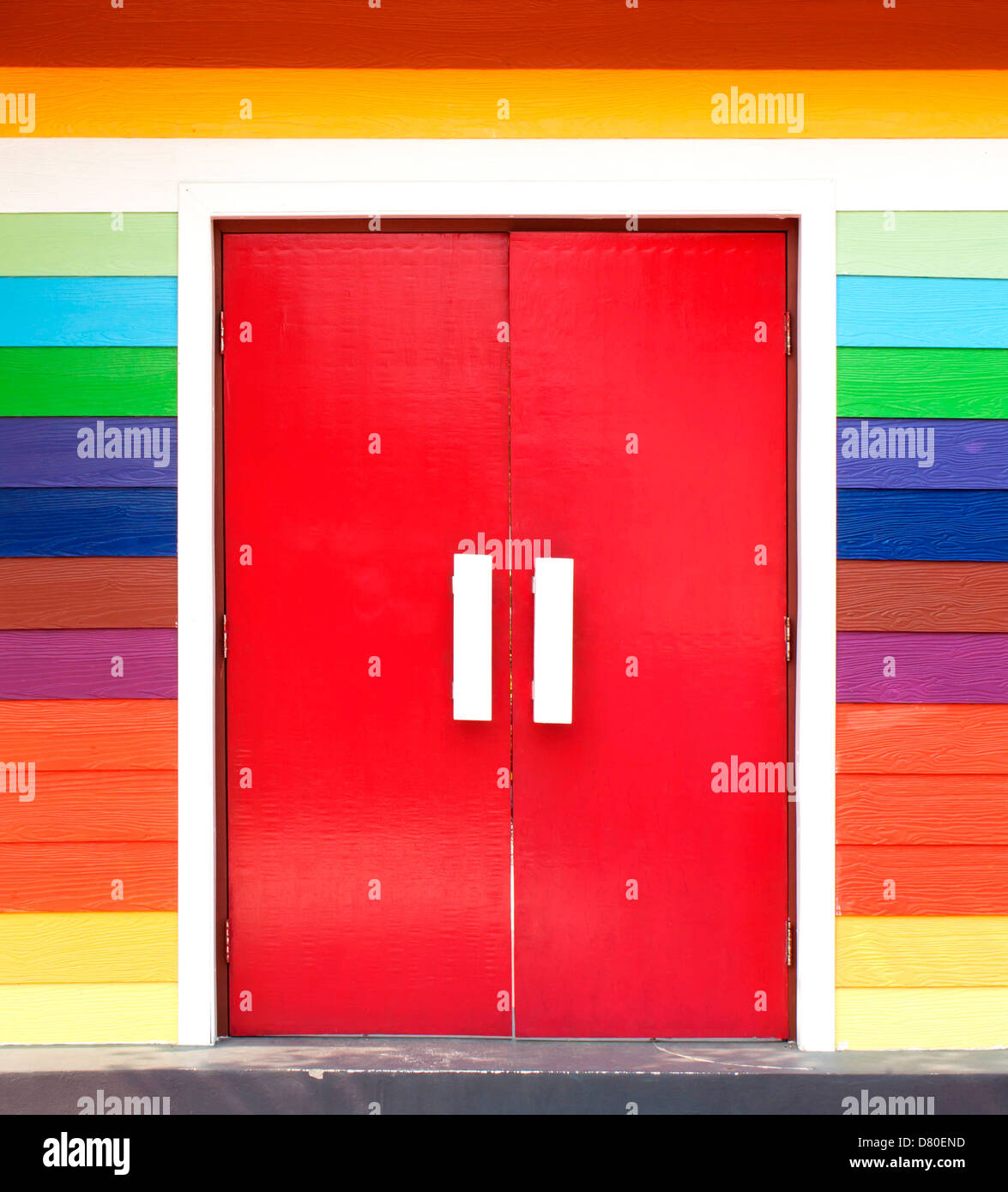 Colorful wooden doors Shera brightly colored walls Stock Photo - Alamy