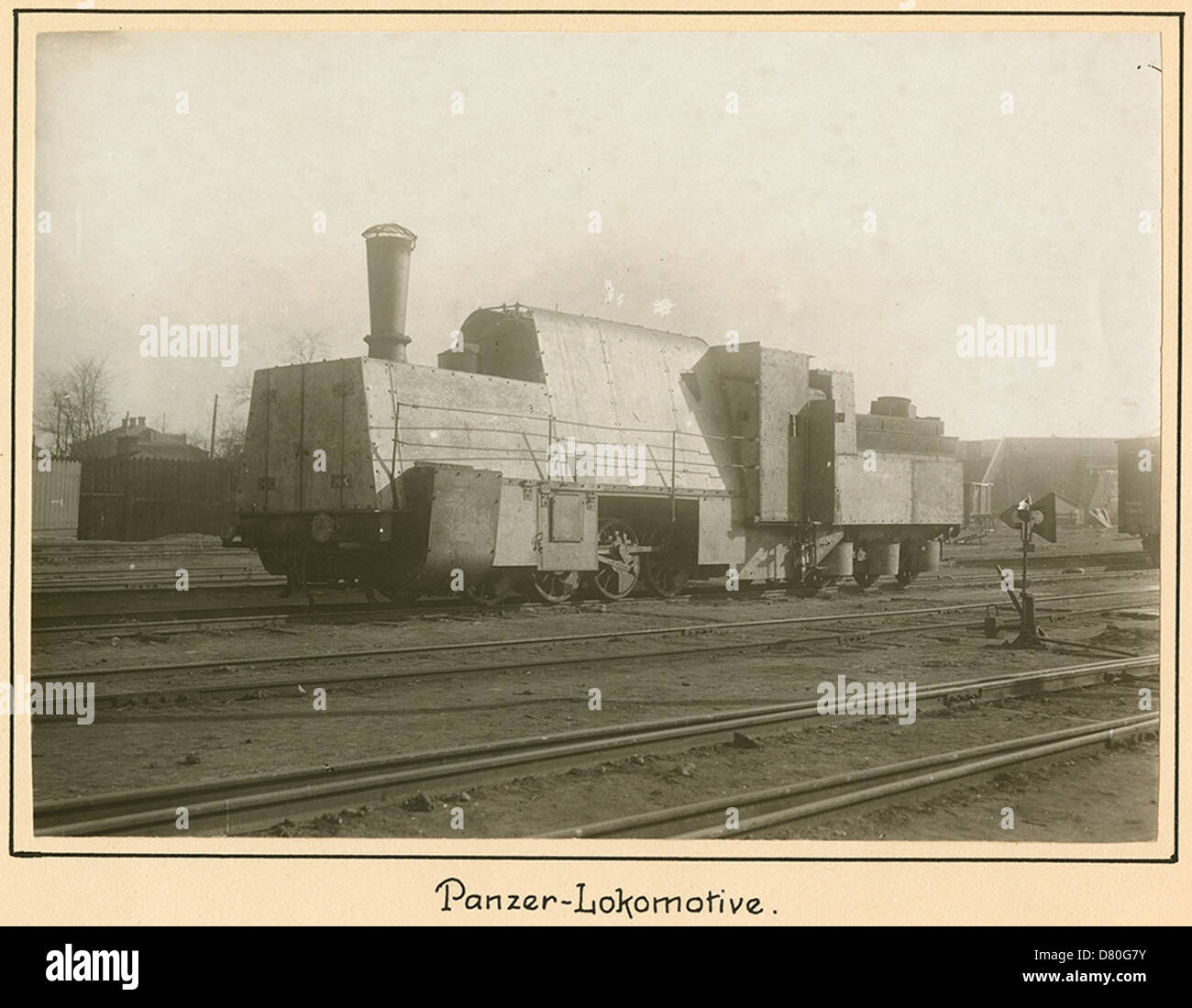 This photograph features a German Panzer locomotive from World War I ...