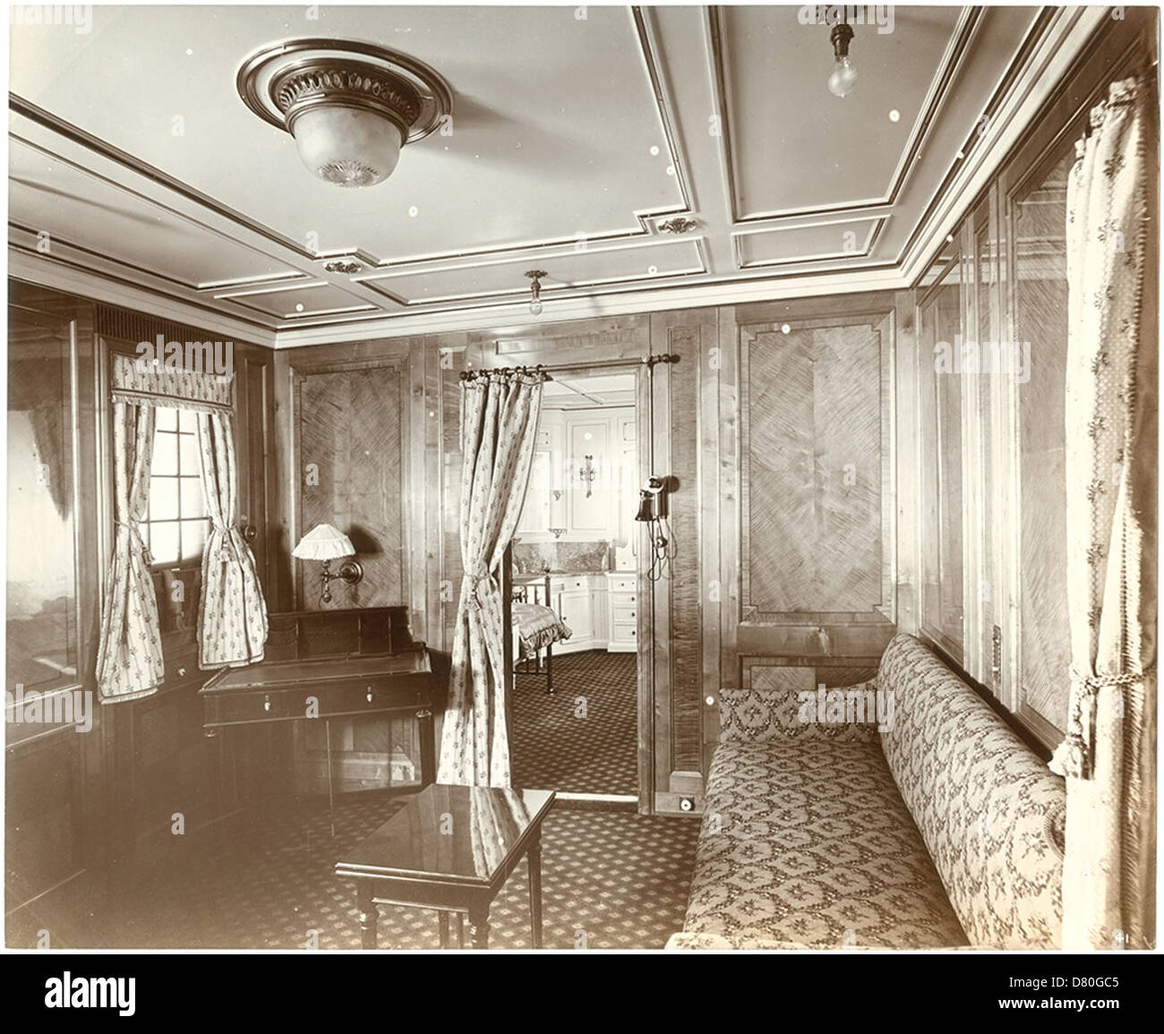 This photograph shows the regal suite parlor aboard an antique Cunard ...
