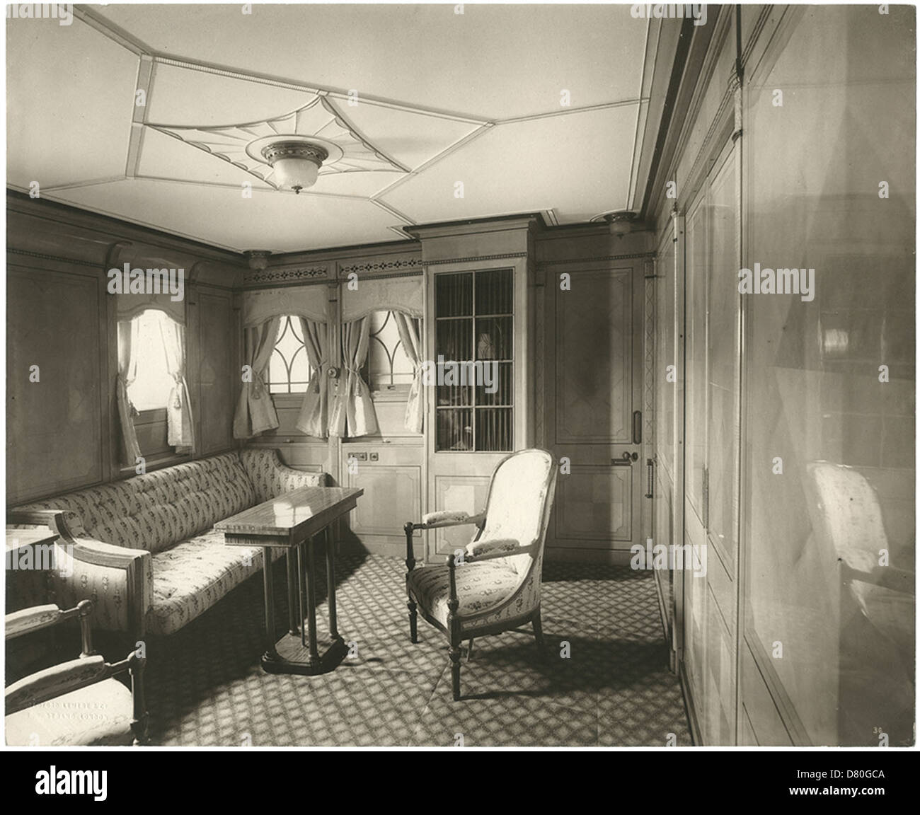 A regal suite parlor aboard a Cunard Line transatlantic ocean liner ...