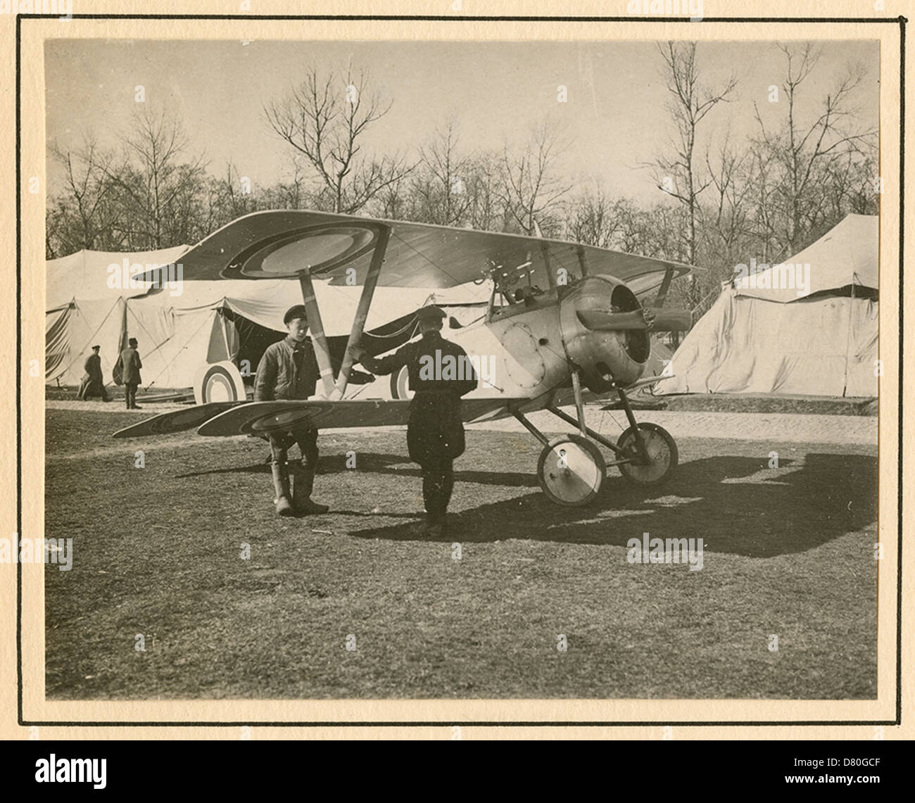 [Two men next to a biplane in Kiev Airfield] Stock Photo - Alamy