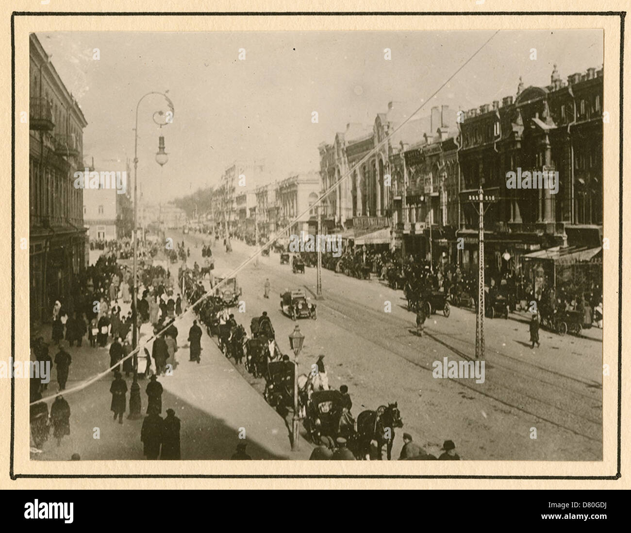 This historical image shows a city street in Kiev during World War I ...