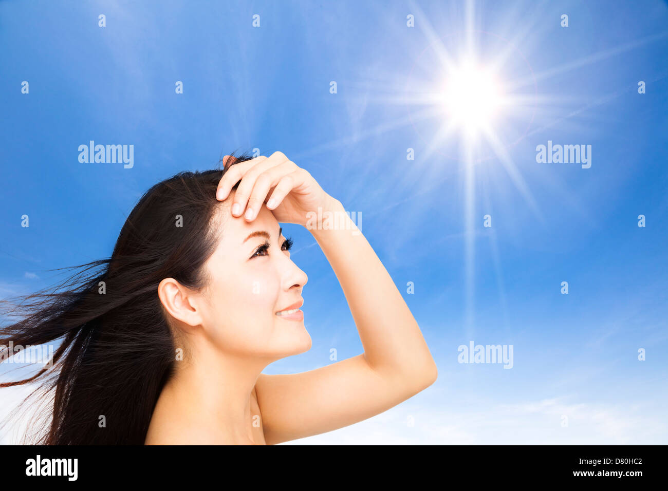 beautiful young woman with sunlight background. summer skin care ...