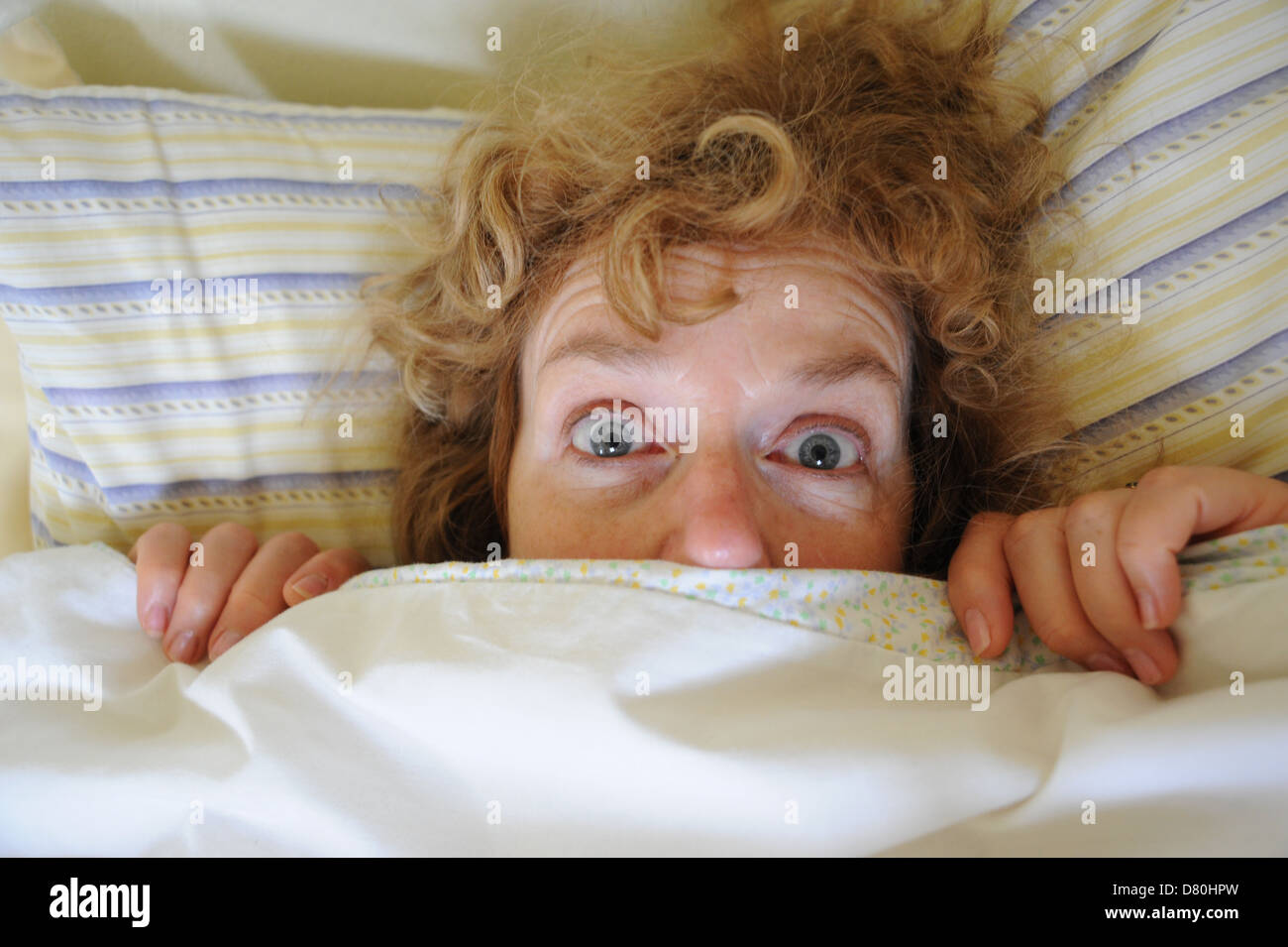 Woman can't sleep scared hi-res stock photography and images - Alamy