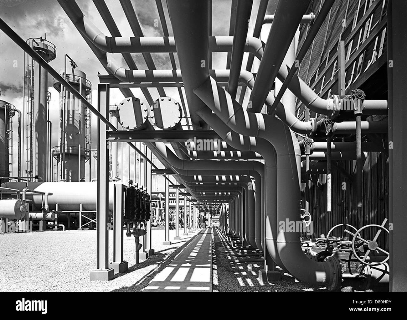 In this photograph, employees of Hudson Engineering Corp. work at an ...