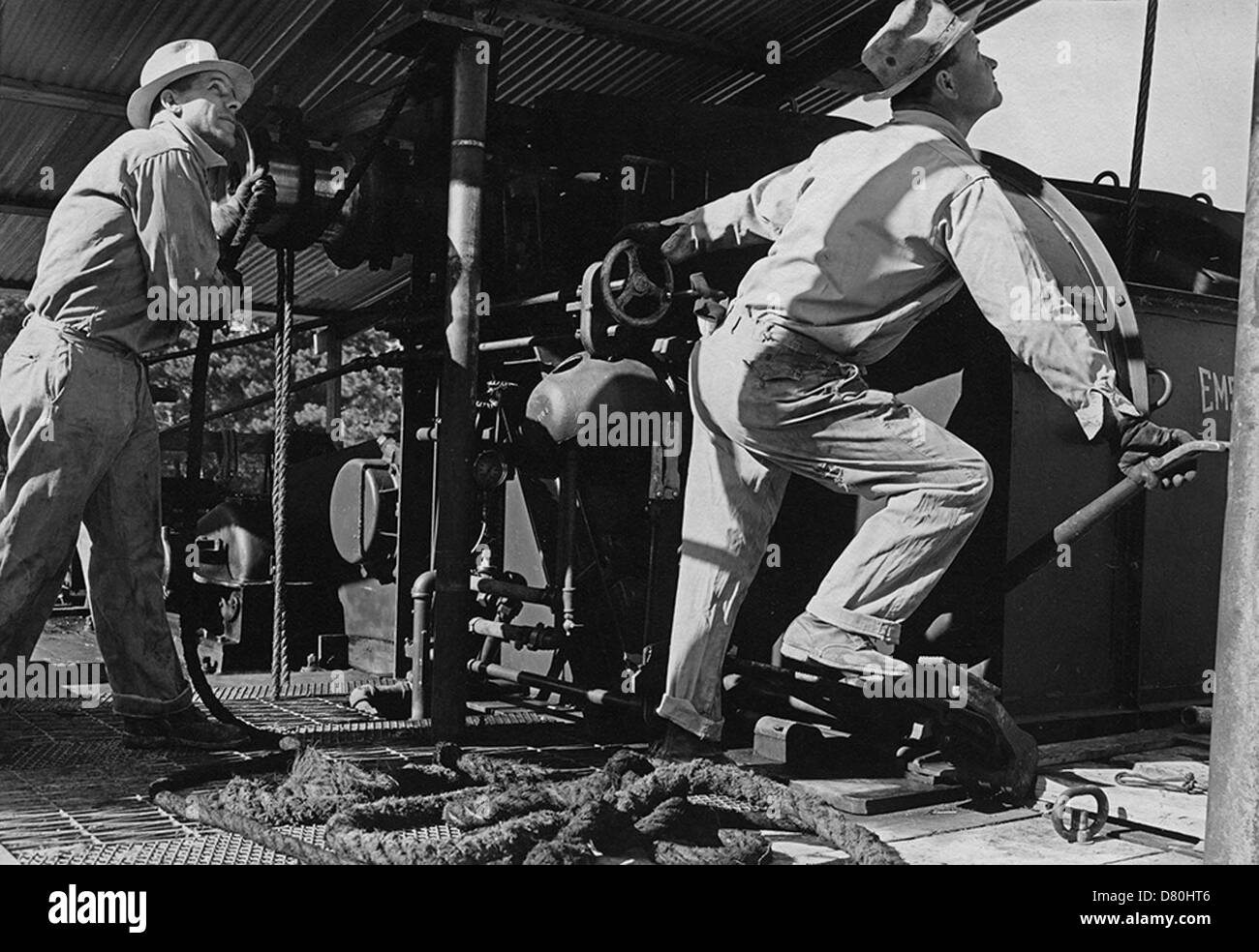 This vintage photograph shows employees of the Continental Emsco ...