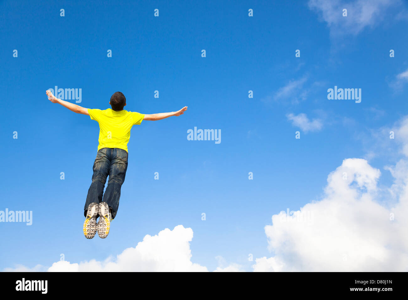 happy young man jumping Stock Photo - Alamy