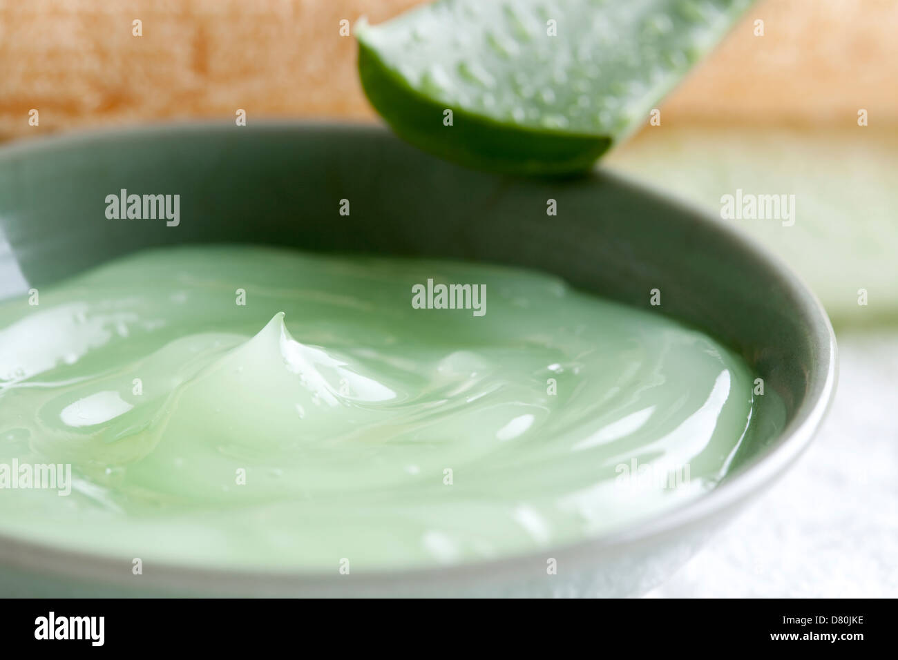 Aloe vera gel and fresh aloe leaf Stock Photo - Alamy