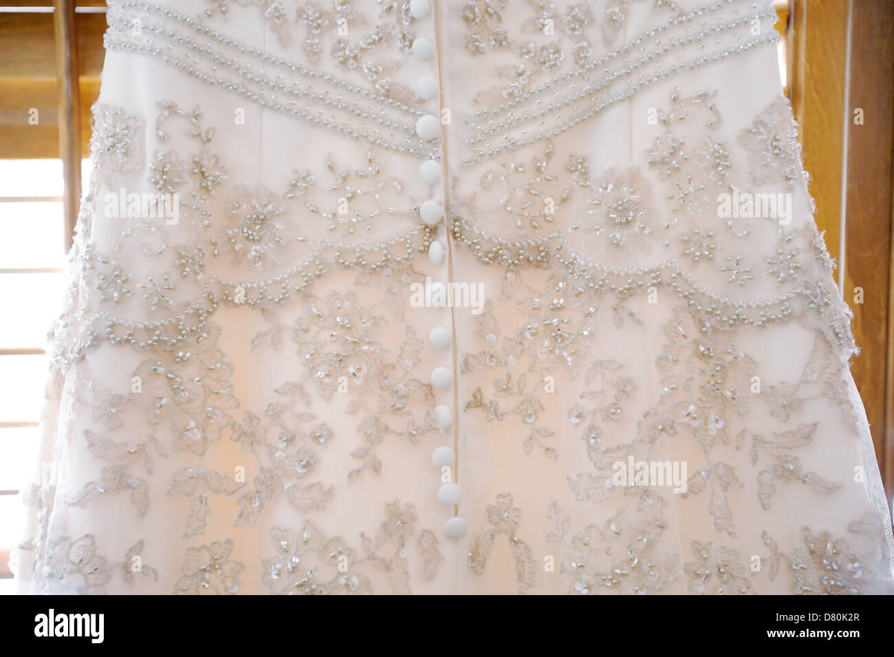 Brides dress close-up showing detail on wedding day Stock Photo - Alamy