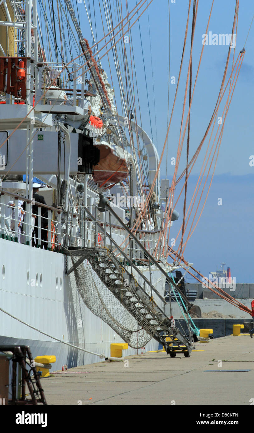 Side view of the historical yacht moored to the quay with ladder Stock ...