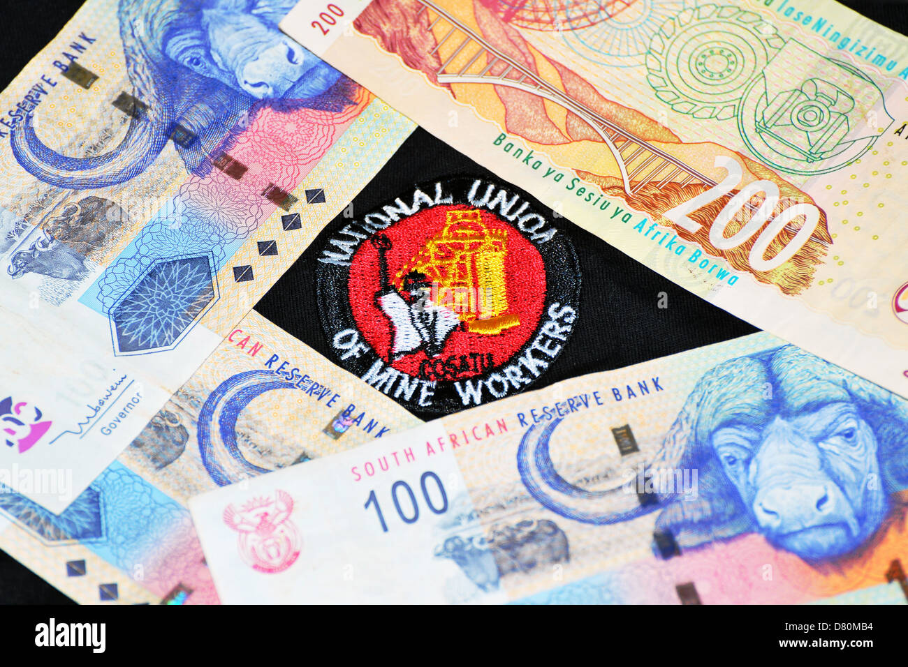 Images of the logo of the South African NUM (National Union of Miners ...