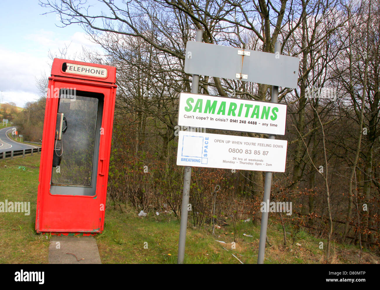 Samaritans and Breathing Space help lines signs beside phone box at ...