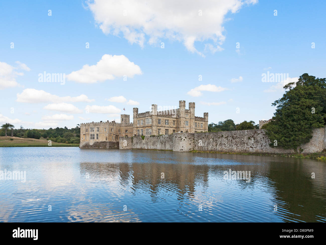 Leeds Castle Kent in south-east England with moat lake under a blue sky ...
