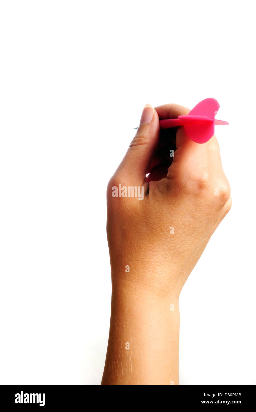 female hand holding a dart Stock Photo - Alamy