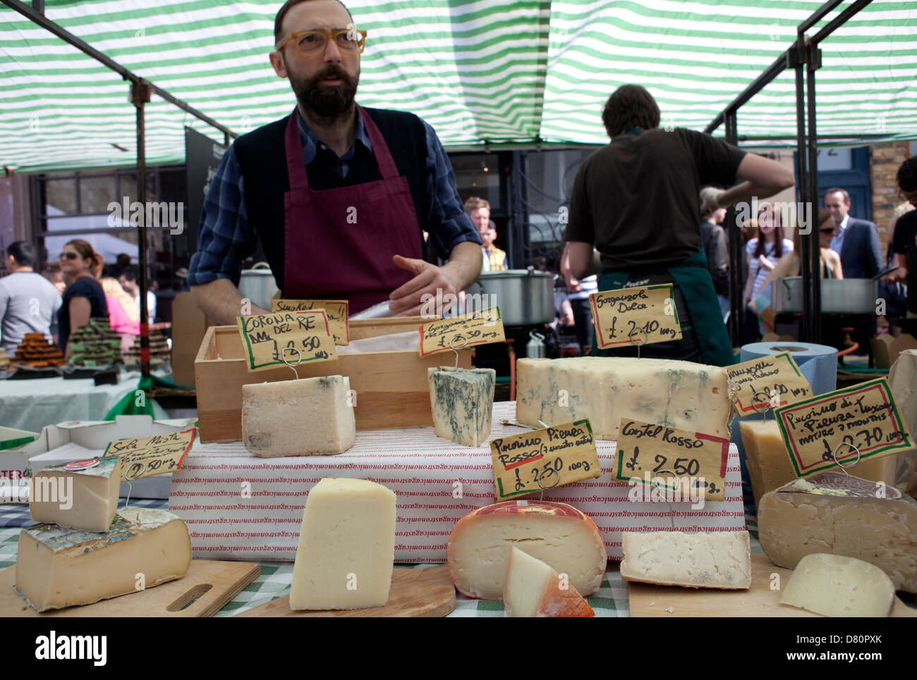 CHEESES ON CHEESE STALL. SCENES AND STALLS FROM BROADWAY FOOD MARKET ...