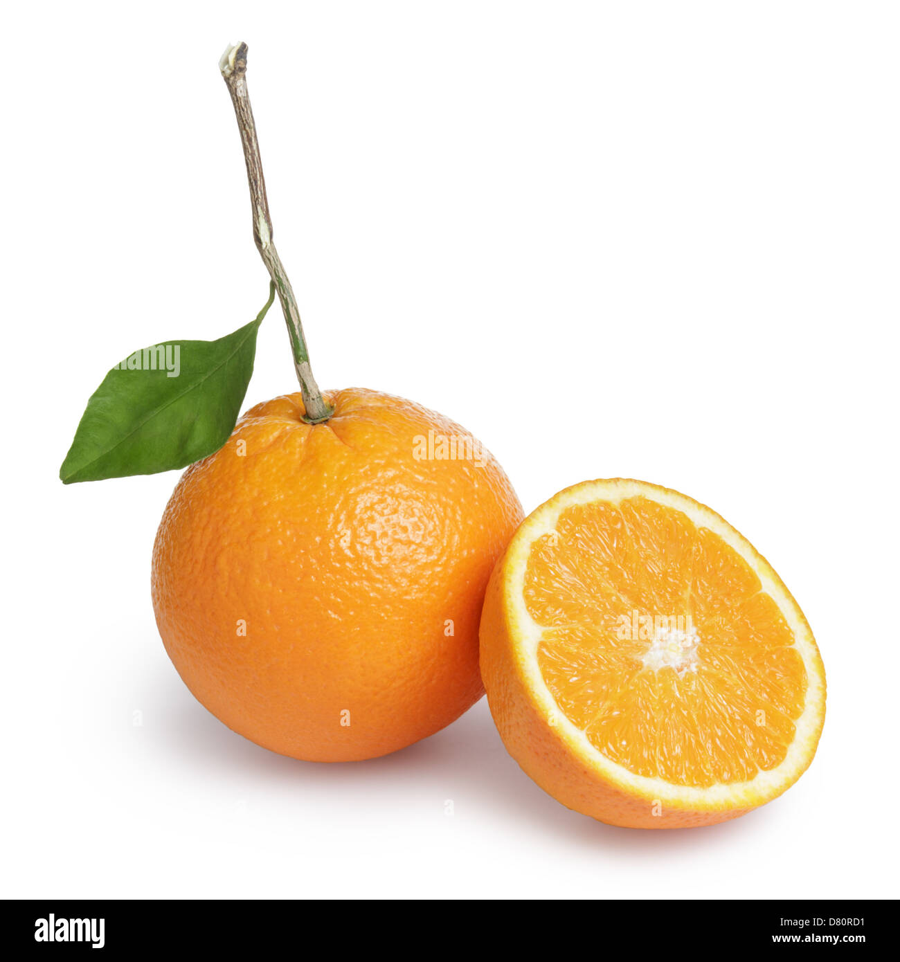 ripe round oranges with half, stem and leaf, isolated on white ...
