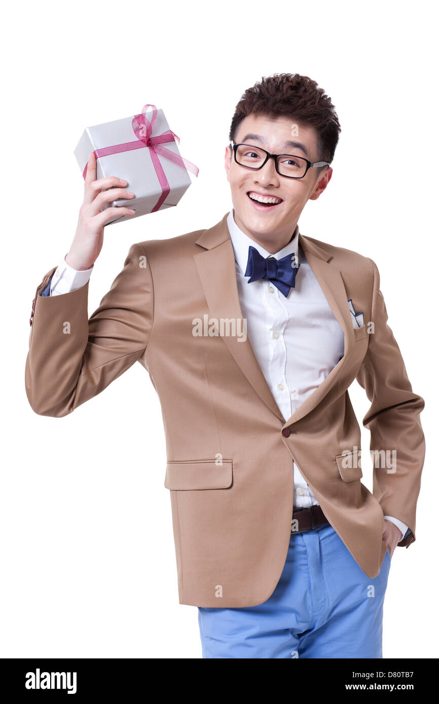 Fashionable businessman with a gift Stock Photo - Alamy