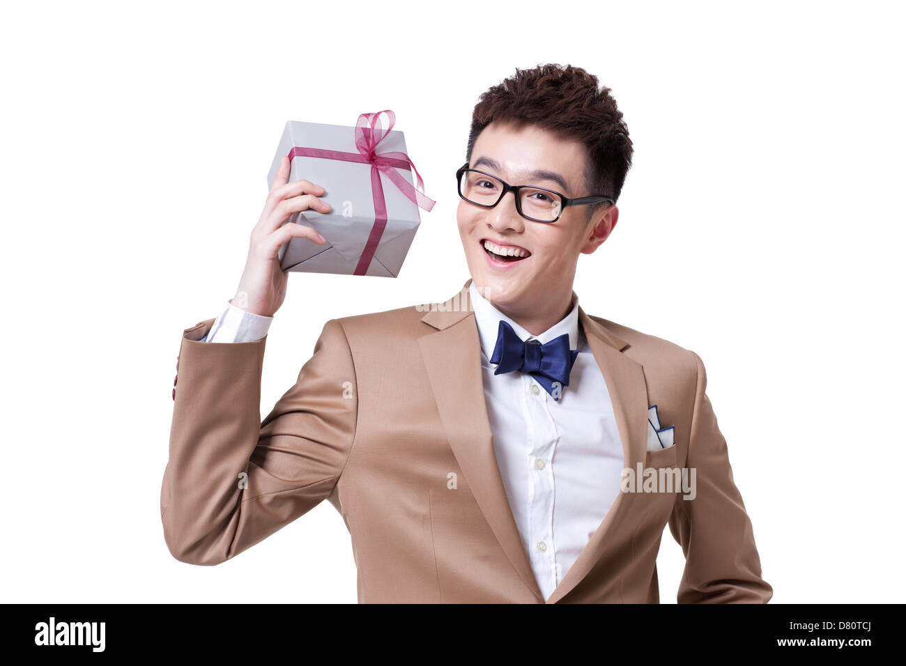 Fashionable businessman with a gift Stock Photo - Alamy